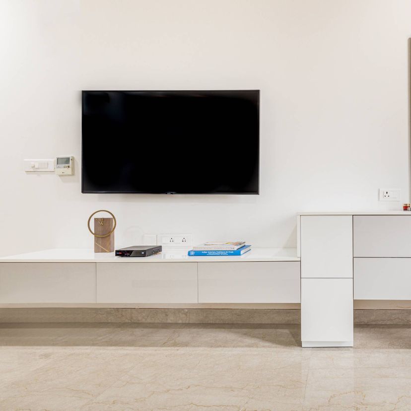 White TV Cabinet Design With A Laminated Finish | Livspace