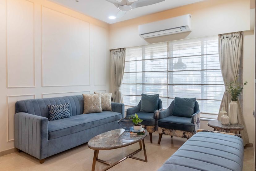 Compact Living Room Design WIth Blue Sofa Set And Oval Coffee Table ...