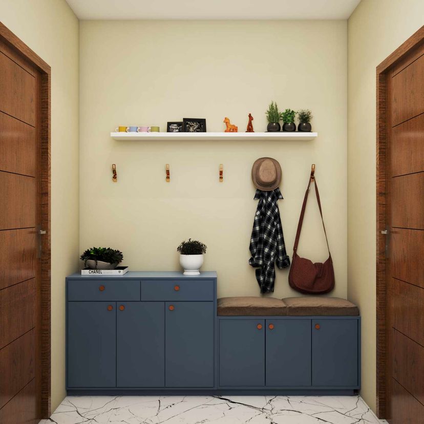 Multifunctional Small Foyer Design With Dark Blue Storage And Seating ...
