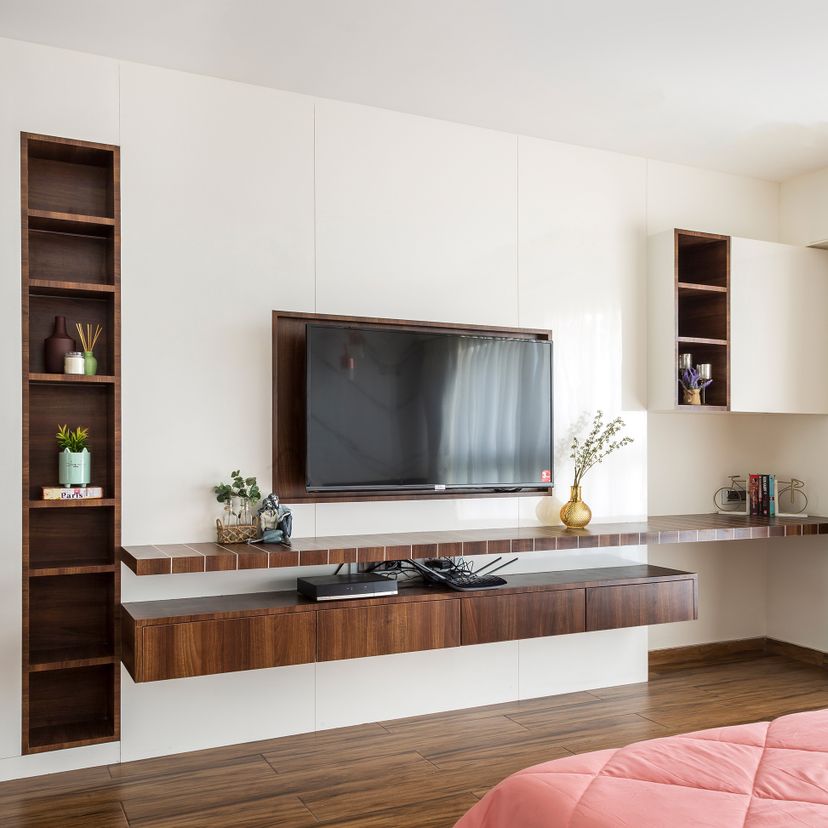 Wooden TV Unit Design With Wall-Mounted Storage Units | Livspace
